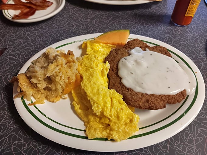 Chicken fried steak with gravy that could make a vegetarian question their life choices. The eggs and hash browns are just supporting players in this meaty drama.