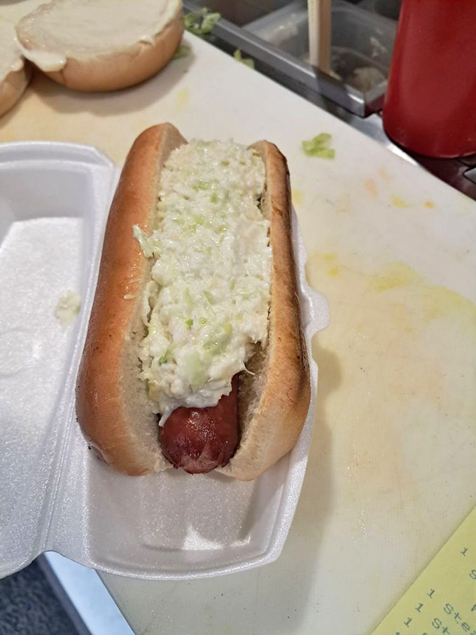 The classic slaw dog: where hot dog meets cool, creamy coleslaw. A perfect temperature contrast that's been making Floridians smile for generations.