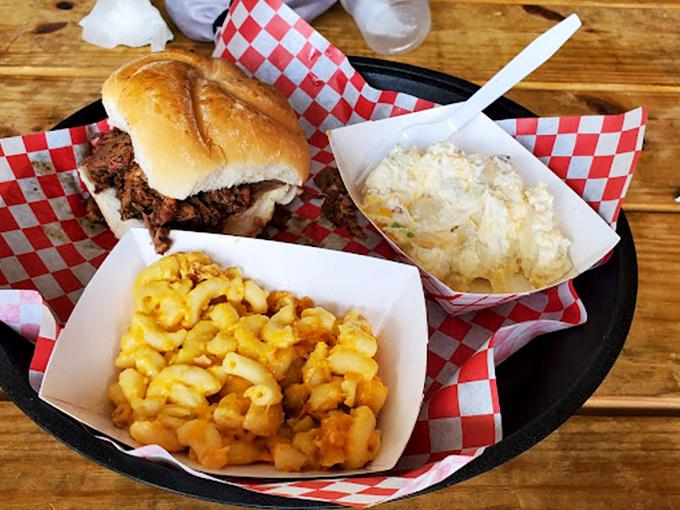 A sandwich that's worth the drive alone, flanked by sides that refuse to be overshadowed. The barbecue trifecta.