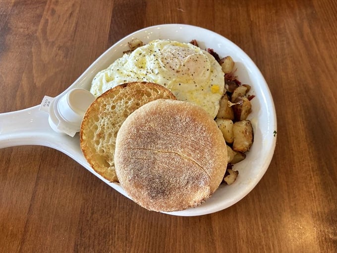 A skillet of morning perfection&mdash;where eggs, potatoes, and an English muffin create the breakfast holy trinity on a handle.