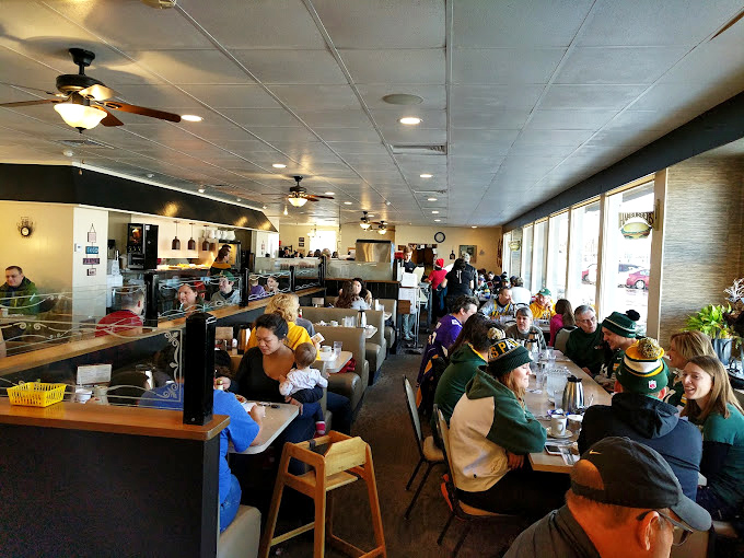 The bustling dining room proves the universal truth: where there's great breakfast, there will be Packers fans and morning philosophers alike.