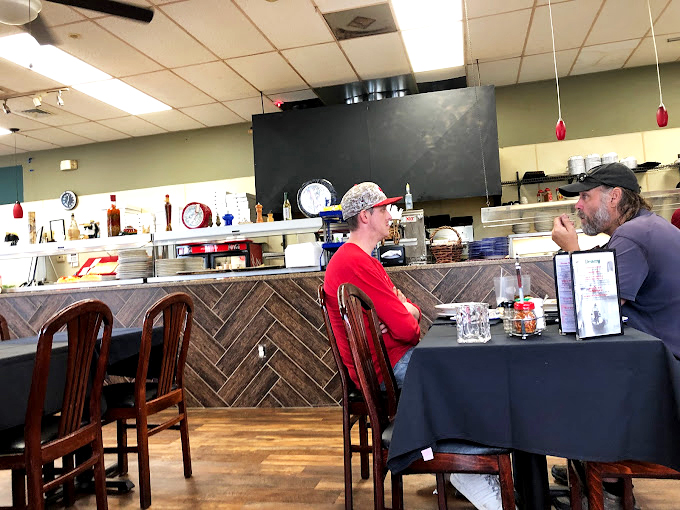 The counter seating offers front-row tickets to the culinary show. Like sitting at your Italian grandmother's kitchen table, if she could feed a hundred people.