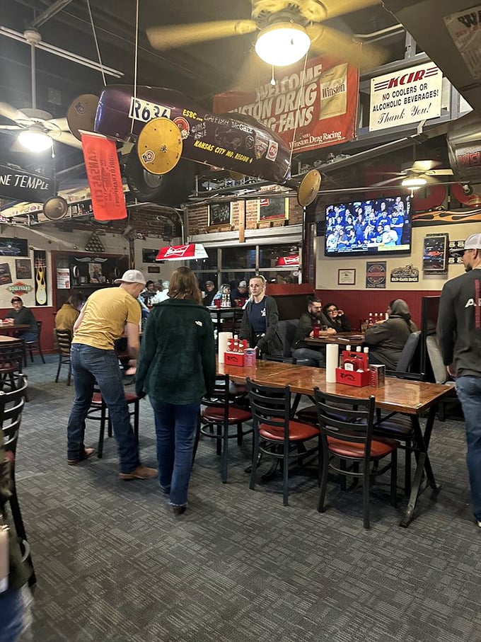 The dining room buzzes with the energy of barbecue pilgrims who've found their shrine. Every table tells a story of flavor discovery.