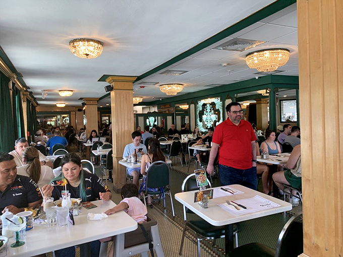 The dining room hums with conversation and clinking plates&mdash;a symphony of satisfaction conducted by generations of Cuban culinary tradition.