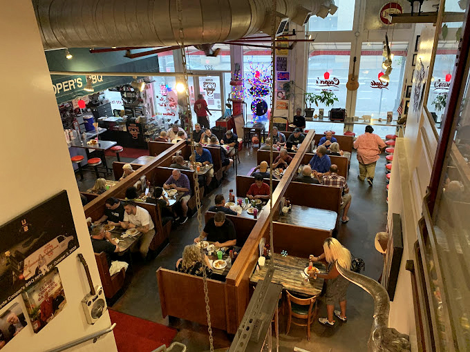 The bird's-eye view of happiness: wooden booths filled with people experiencing what might be the best lunch decision they've made all week.
