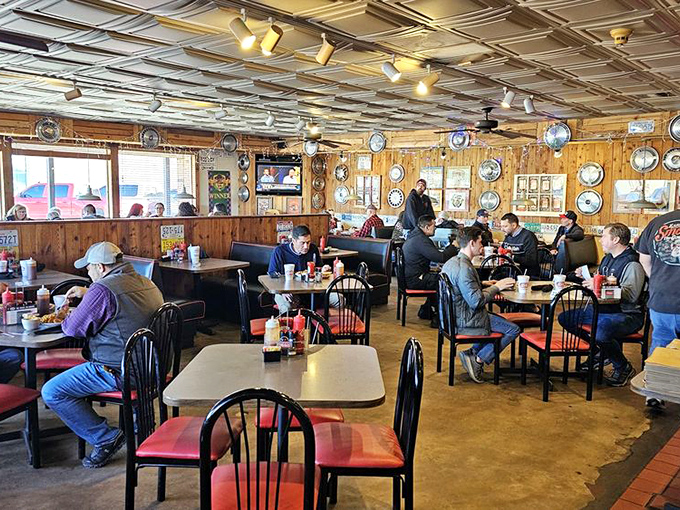 A dining room full of people who've made the wise decision to let someone else do the smoking. Barbecue brings strangers together.