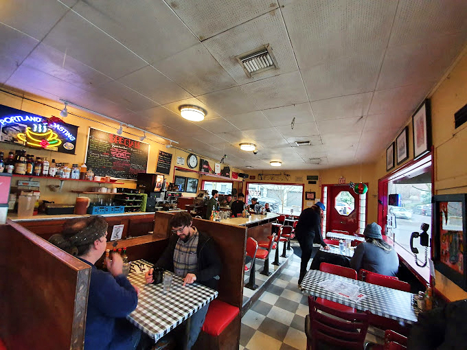 The checkered tablecloths and wooden booths aren't retro by design&mdash;they're authentic by survival, outlasting every food trend since the 70s.