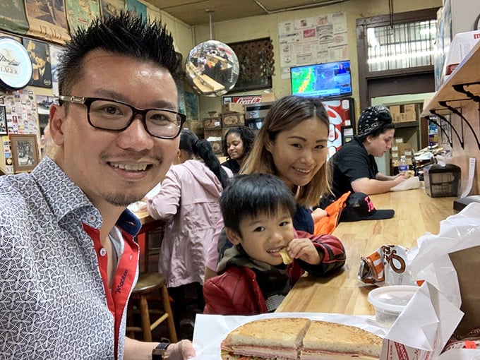 Family traditions are built around shared food experiences, and this muffuletta table has witnessed more memorable meals than most five-star restaurants.