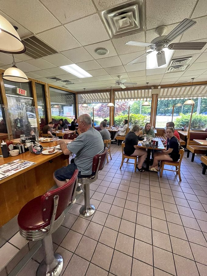The true measure of a breakfast spot isn't just the food, but the community it creates &ndash; strangers becoming neighbors over shared maple syrup bottles. 