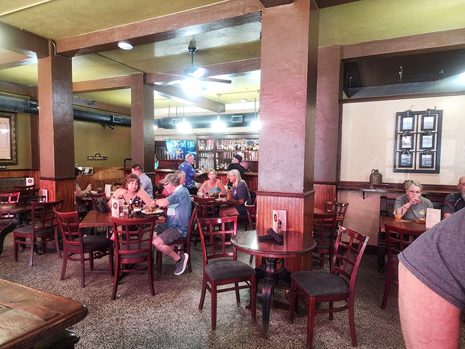 Where locals and travelers merge like tributaries into a river of conversation, laughter, and the shared religion of good food.