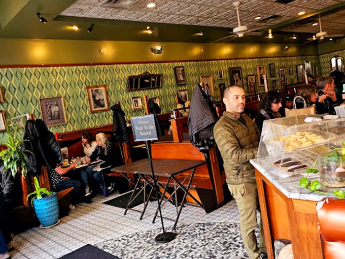 The dining room hums with the energy of satisfied customers. Those wooden booths have supported countless elbows during "just one more bite" moments. 