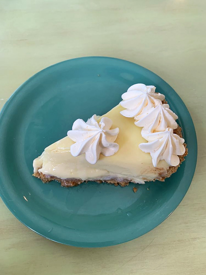 This slice of Key lime pie isn't playing hard to get&mdash;it's showing off its pale yellow authenticity and creamy confidence on a turquoise stage.