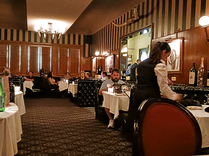 The dining room hums with the satisfied murmurs of people having exactly the meal they hoped for. Notice the lack of phone-checking?