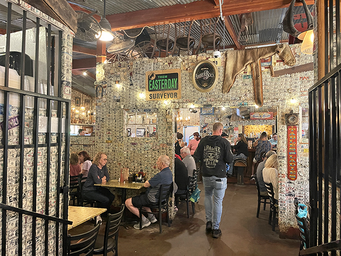 The dining room buzzes with conversation and laughter, all under the watchful gaze of thousands of George Washingtons plastered to every surface.