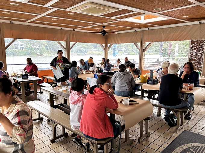 The covered deck at Cantler's&mdash;where strangers become friends over shared crackers and mallets. Notice how nobody's looking at their phones? That's the magic.