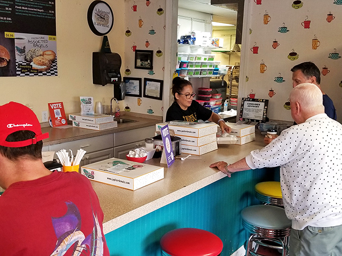 The sacred exchange: dollars for donuts. A transaction as old as time, but infinitely more satisfying.