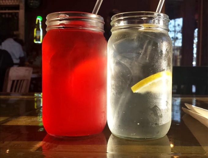Mason jar beverages that bring Southern charm to Oakland &ndash; one refreshingly red, one cool and clear with lemon, both perfect for washing down barbecue.