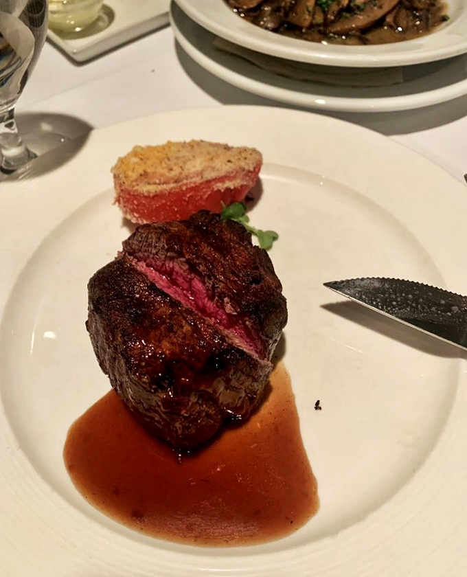 Meat perfection achieved: that glorious medium-rare interior surrounded by a mahogany crust is the edible equivalent of finding front-row concert tickets.