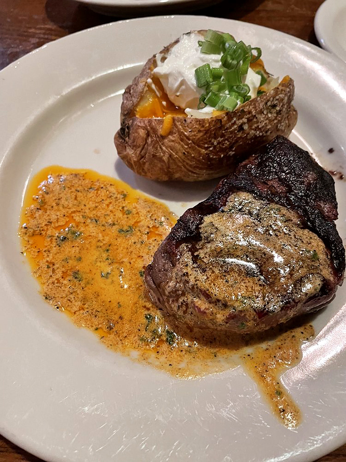 This filet with its glistening sauce is having a moment. That loaded baked potato isn't just a side&mdash;it's practically a co-headliner.