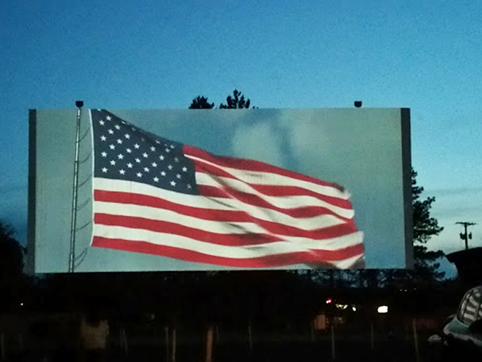 Old Glory waves across the massive screen&mdash;a patriotic prelude that reminds us some traditions are worth preserving.
