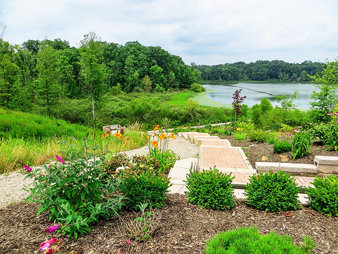 Garden path to tranquility, where wildflowers and cultivated blooms create a colorful runway leading straight to lakeside serenity. 