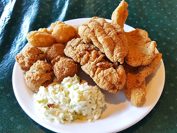 This isn't just fried fish&mdash;it's edible gold, with a cornmeal crust that shatters with each bite revealing flaky perfection beneath.