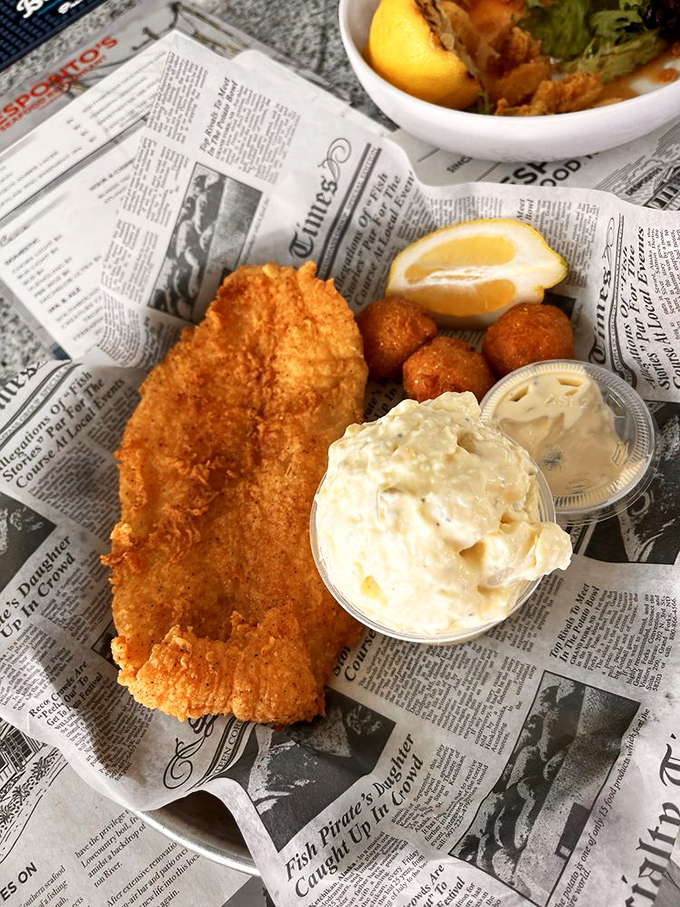 This golden-fried fish isn't just food&mdash;it's edible sunshine, especially when paired with that cloud-like side of coleslaw.
