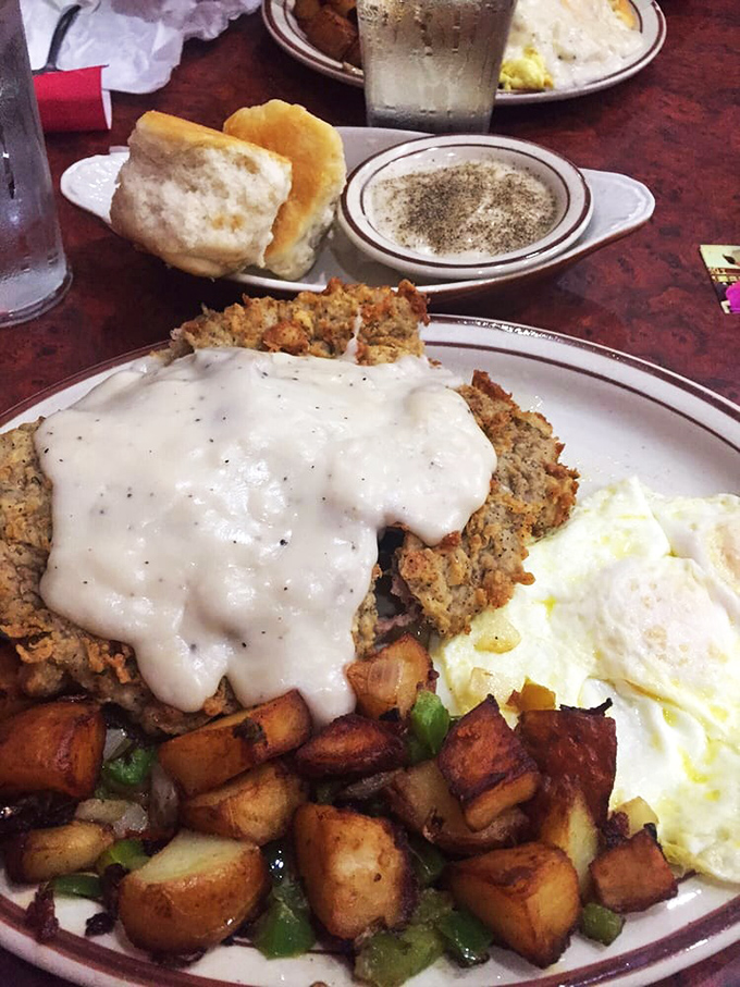 Country fried steak smothered in gravy – Oklahoma's version of "I love you" served on a plate with eggs and potatoes.