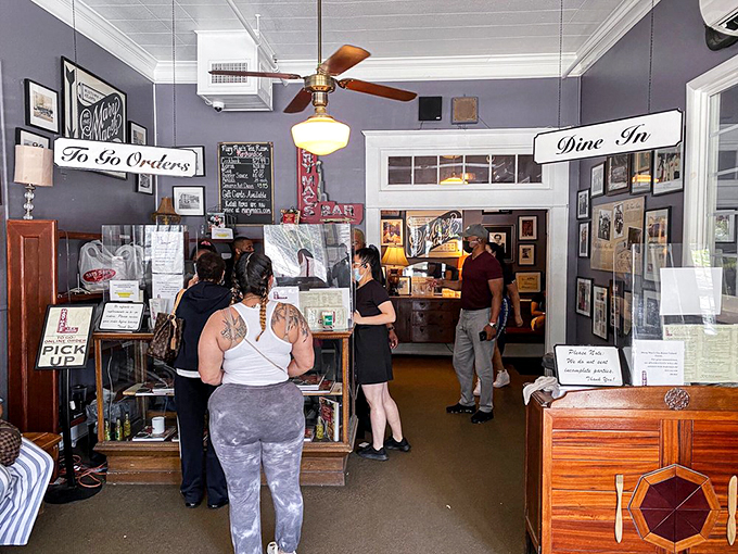 The front counter's "To Go Orders" and "Dine In" signs aren't just directions&mdash;they're life choices that will haunt your dreams either way.