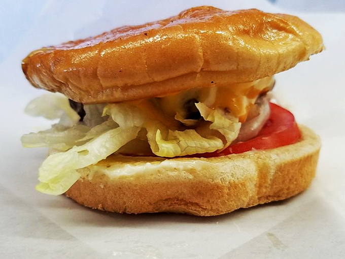 Sometimes perfection comes without frills&mdash;just beef, cheese, fresh toppings, and a soft bun that yields to reveal the harmony within.