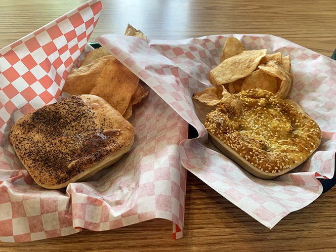 Two pies, infinite happiness. The poppy seeds and sesame crust aren't just toppings&mdash;they're edible jewelry for these savory treasures.