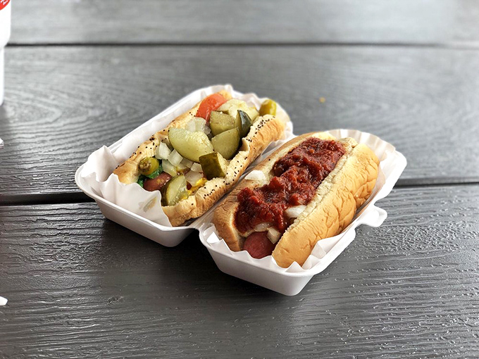 A tale of two dogs—one Chicago-style, one chili-topped. It's not choosing favorites; it's embracing diversity.