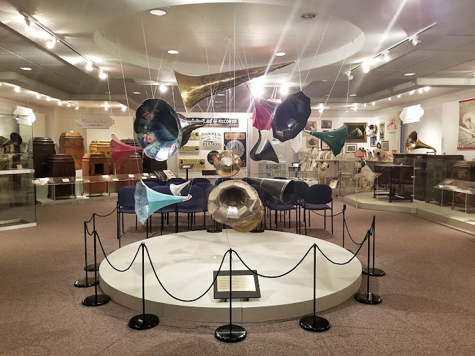 The museum's thoughtful displays create a cathedral-like atmosphere, honoring these wooden cabinets as the sacred vessels they once were.
