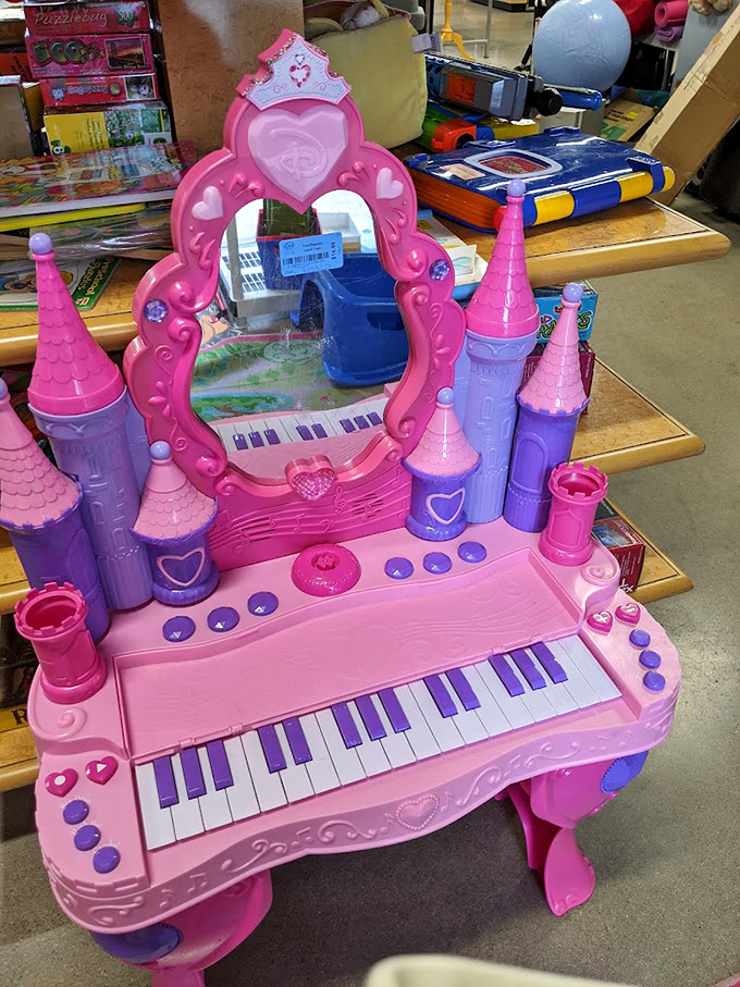 A pink castle vanity with keyboard awaits its next princess, where musical talents and royal daydreams can flourish simultaneously.