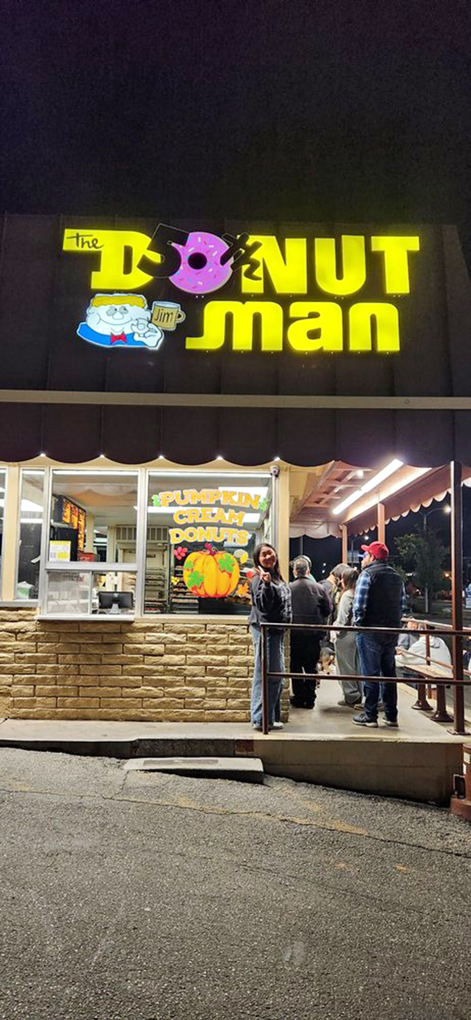 The neon sign glows like a lighthouse for night owls and early birds alike&mdash;guiding hungry souls to donut salvation.