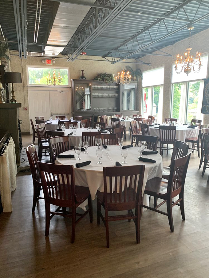 A dining room that invites lingering conversation. Those chandeliers have witnessed countless marriage proposals, anniversaries, and "just because" celebrations.