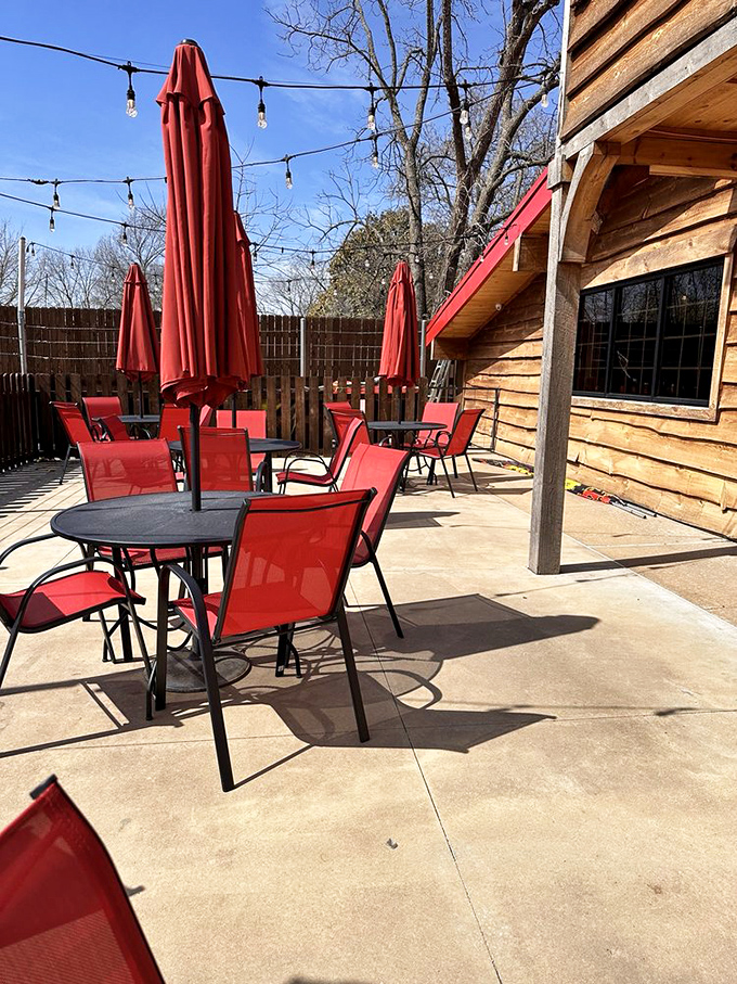The outdoor patio&mdash;where fresh air and barbecue aromas create the perfect dining atmosphere. Those string lights aren't just decoration; they're mood-setters.