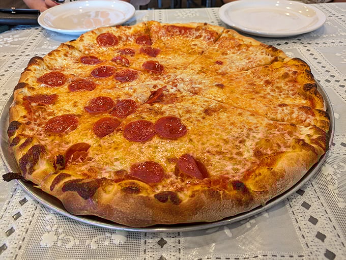 Pizza perfection isn't complicated: a crust with character, sauce with soul, cheese with stretch, and pepperoni that curls into little flavor cups.