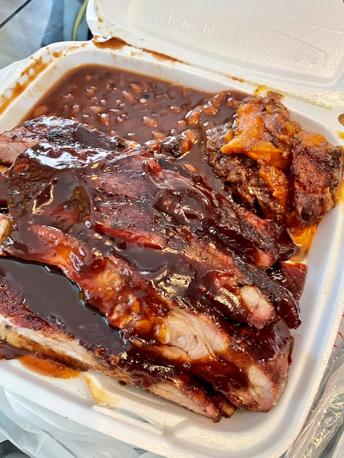 These sauce-lacquered ribs aren't just food&mdash;they're edible art. The glistening sauce creates a mahogany masterpiece that belongs in the Louvre of lunch.