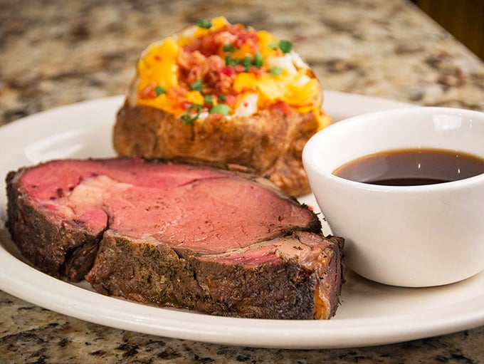 Prime rib so perfectly cooked it deserves its own Instagram account. That loaded baked potato is no slouch either.