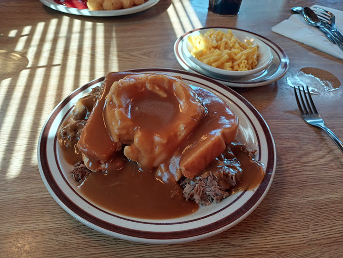 Hot roast beef swimming in gravy with a side of mac and cheese. When comfort food gets its PhD, this is the dissertation.