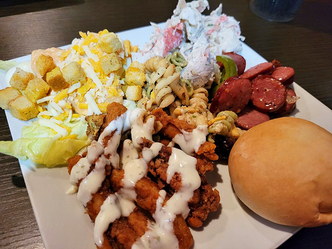 The overachiever's salad bar plate: a little of everything, arranged with the precision of someone who knows this might be their only vegetable opportunity for days.