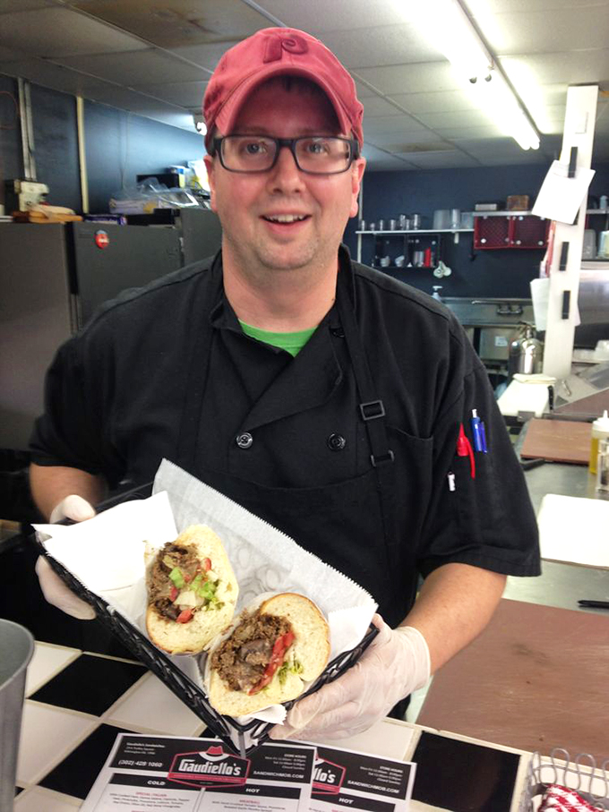 The sandwich artist at work! Pride shines as brightly as the freshly prepared sandwiches &ndash; craftsmanship you can taste in every bite.