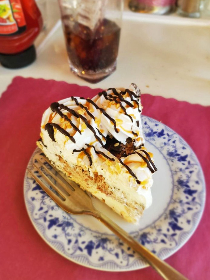 This isn't just dessert&mdash;it's architecture. Layers of cream, caramel, and chocolate create a symphony that makes spoons move involuntarily toward plates.