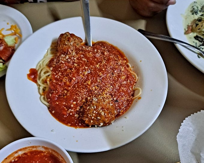 Spaghetti with meatballs—where the sauce clings to each strand like it's afraid of falling off. This is pasta with commitment issues solved.