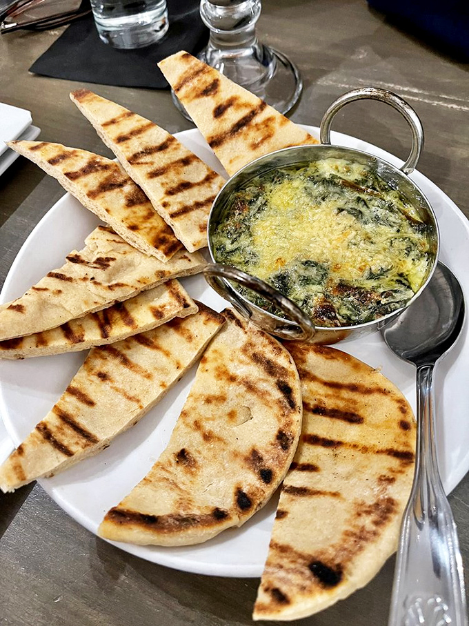 This bubbling spinach dip with grilled flatbread is what appetizer dreams are made of. The perfect prelude to seafood nirvana.