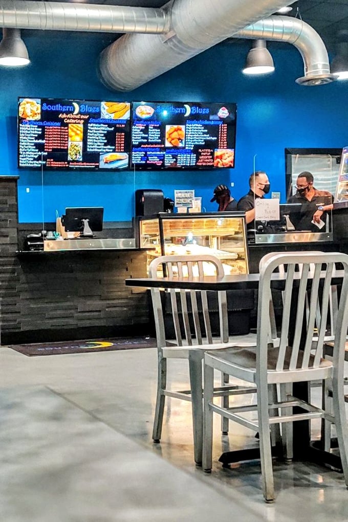 Behind that counter, culinary magic happens with the efficiency of people who know exactly what they're doing.