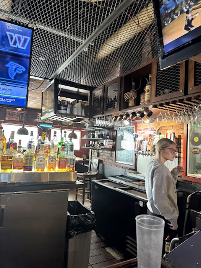 The bar area&mdash;where sports on screens and amber bottles create the perfect backdrop for stories that get better with each retelling.