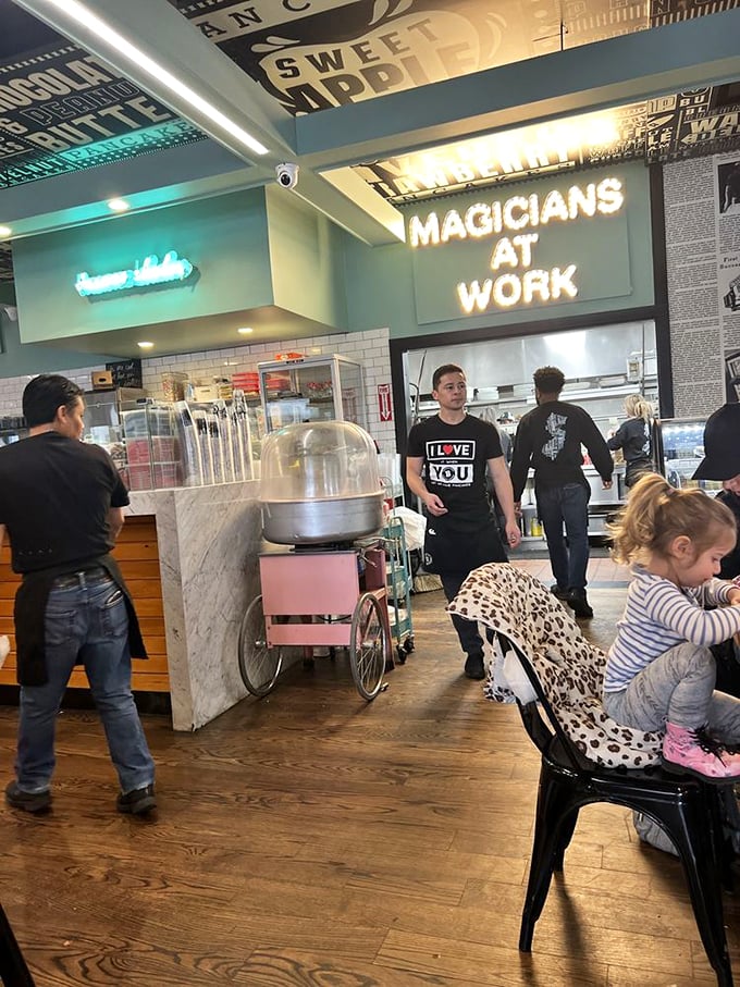 The sign doesn't lie&mdash;there are indeed "Magicians at Work" in this kitchen. The staff orchestrates breakfast symphonies while hungry audiences await their masterpieces.