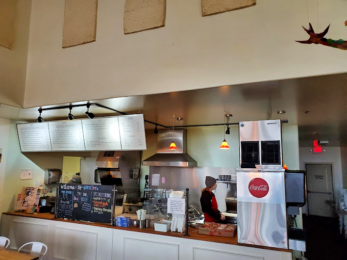 Where waffle magic happens. The open kitchen design lets you witness the transformation from batter to beautiful.